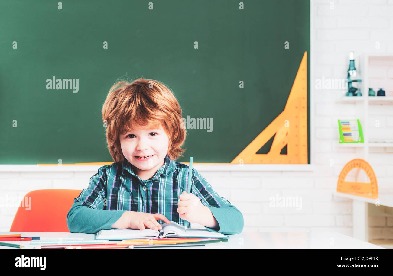 Portrait of Pupil of primary school study indoors. Pupil learning ...