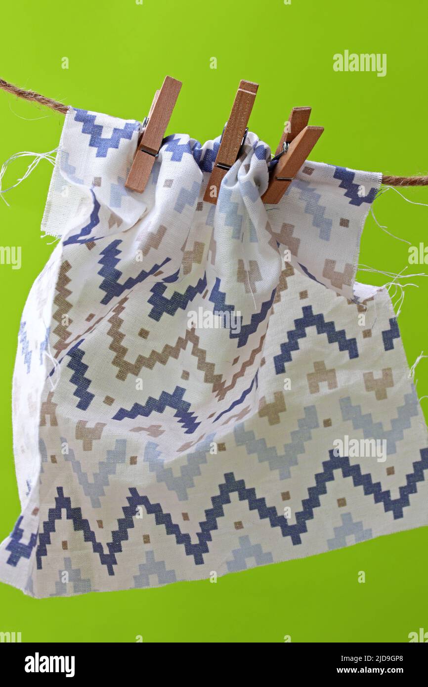 Colorful clothes drying on clothesline Stock Photo - Alamy