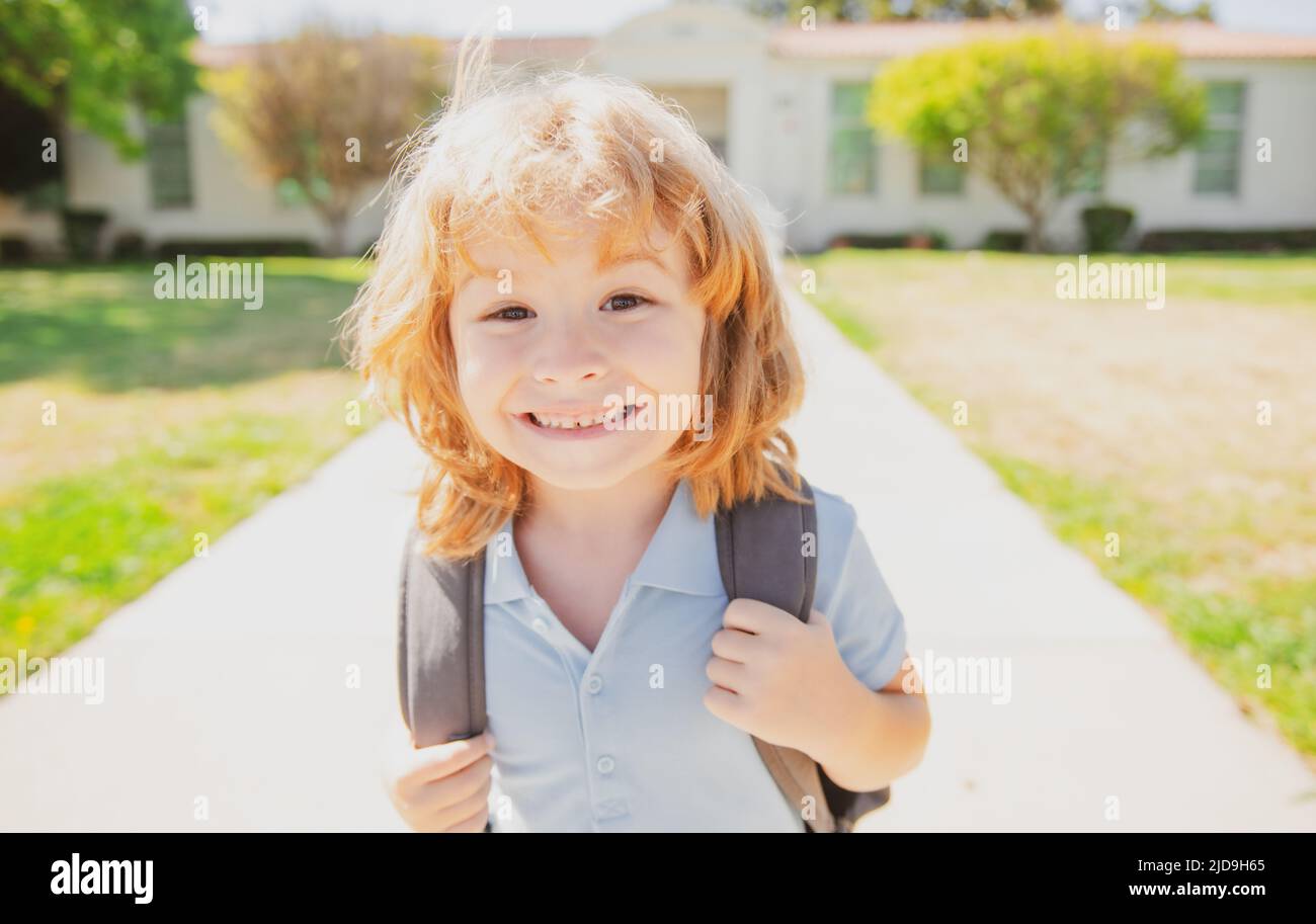 Funny school boy face. Back to school. Portrait of excited kid with ...