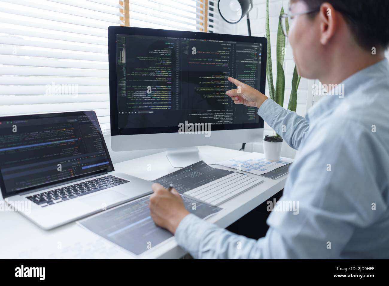 Writing codes typing data hi-res stock photography and images - Alamy