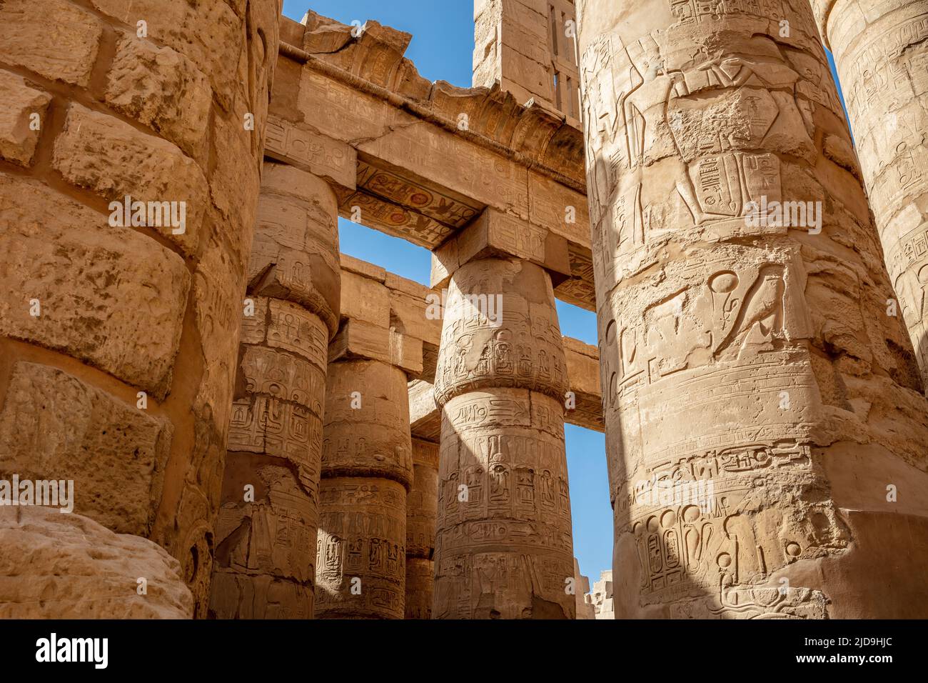 Different hieroglyphs on the walls and columns in the Karnak temple. Karnak temple is the ...