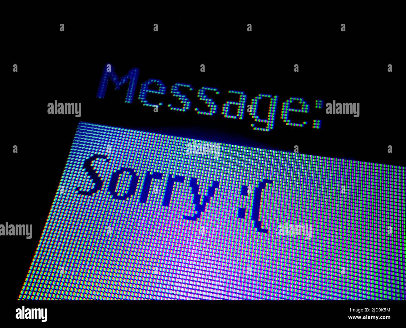 Sorry written on mobile screen Stock Photo - Alamy