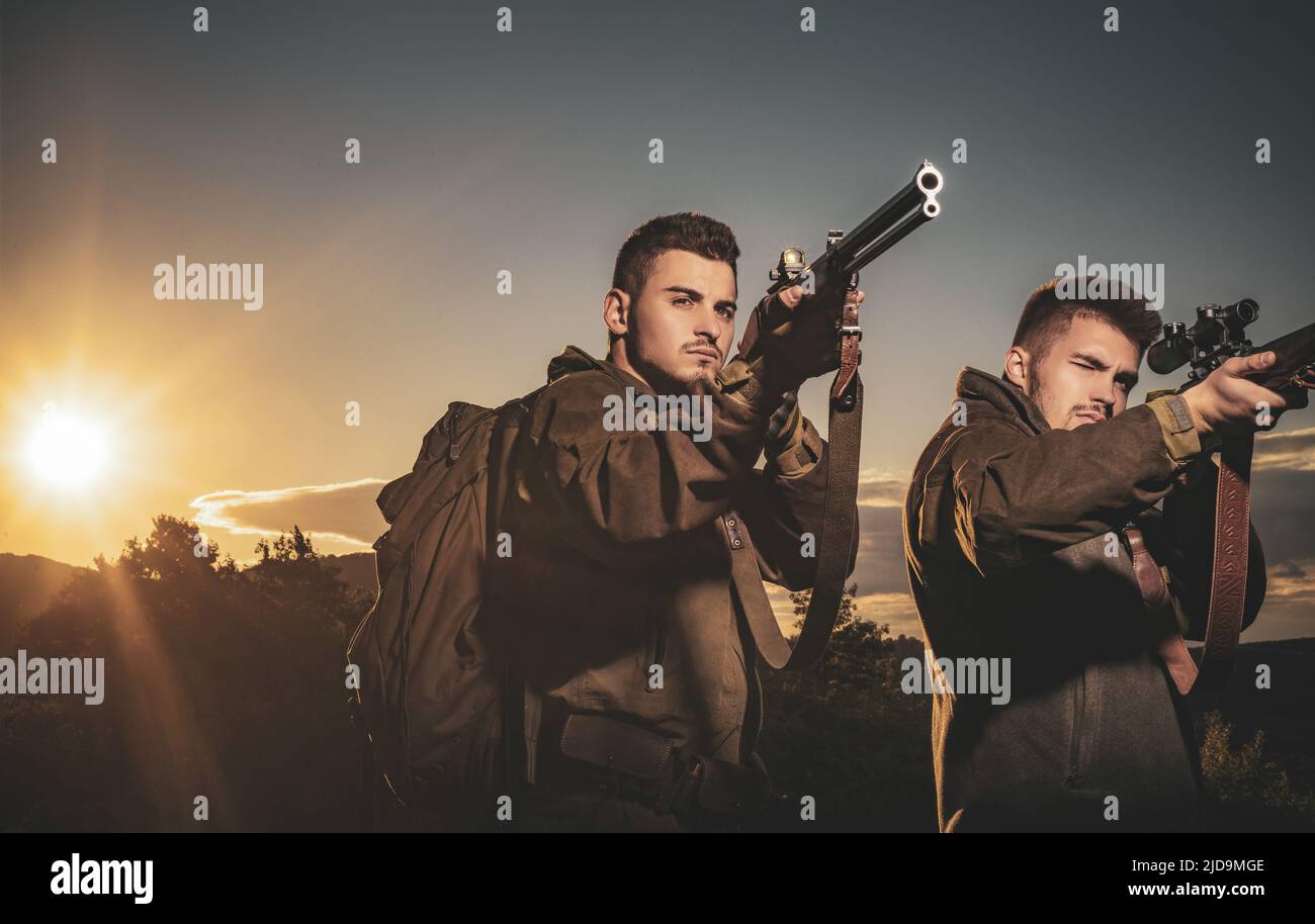 Hunting gun. Hunter aiming rifle in forest. Calibers of hunting rifles ...