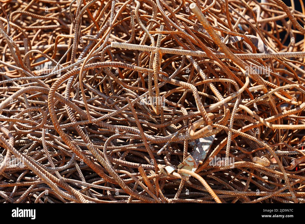 Old iron rods collected on a demolition site Stock Photo - Alamy