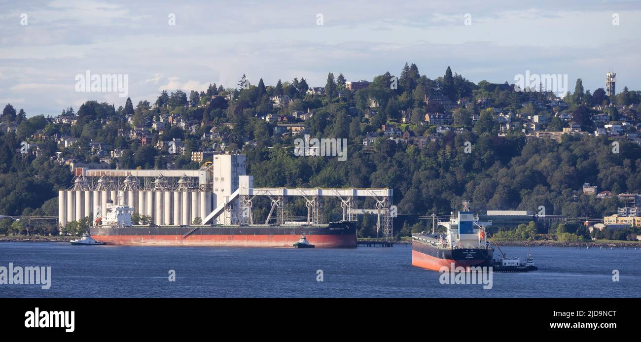 Big Tanker Ship and Industrial Sites in the modern city Stock Photo - Alamy