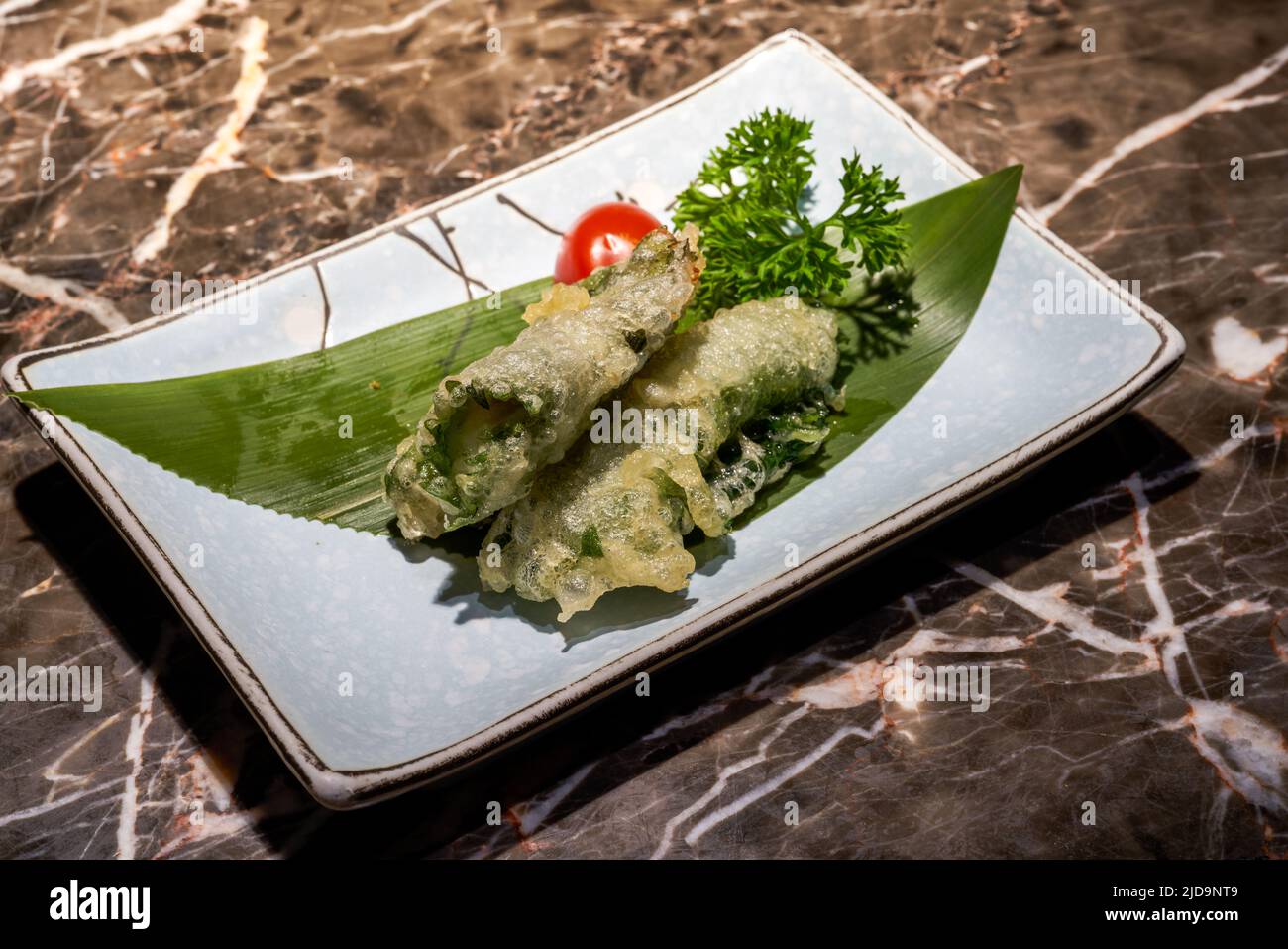 A delicious Japanese dish, vegetable tempura Stock Photo - Alamy