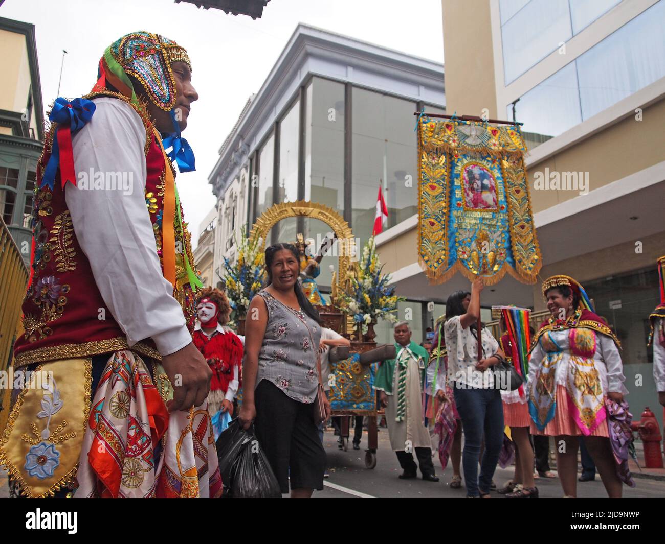 Indigenous men wearing andean typical costume when hundreds of Quechua ...
