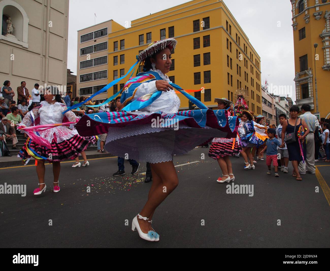 An indigenous woman wearing andean typical costume dancing when ...