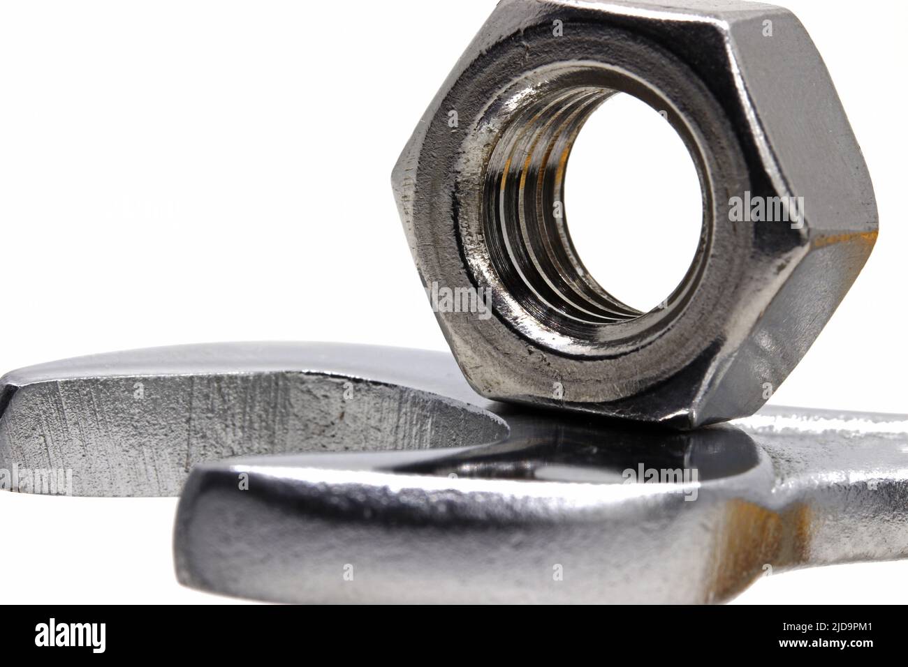 bolt nut and wrench isolated on white background Stock Photo - Alamy
