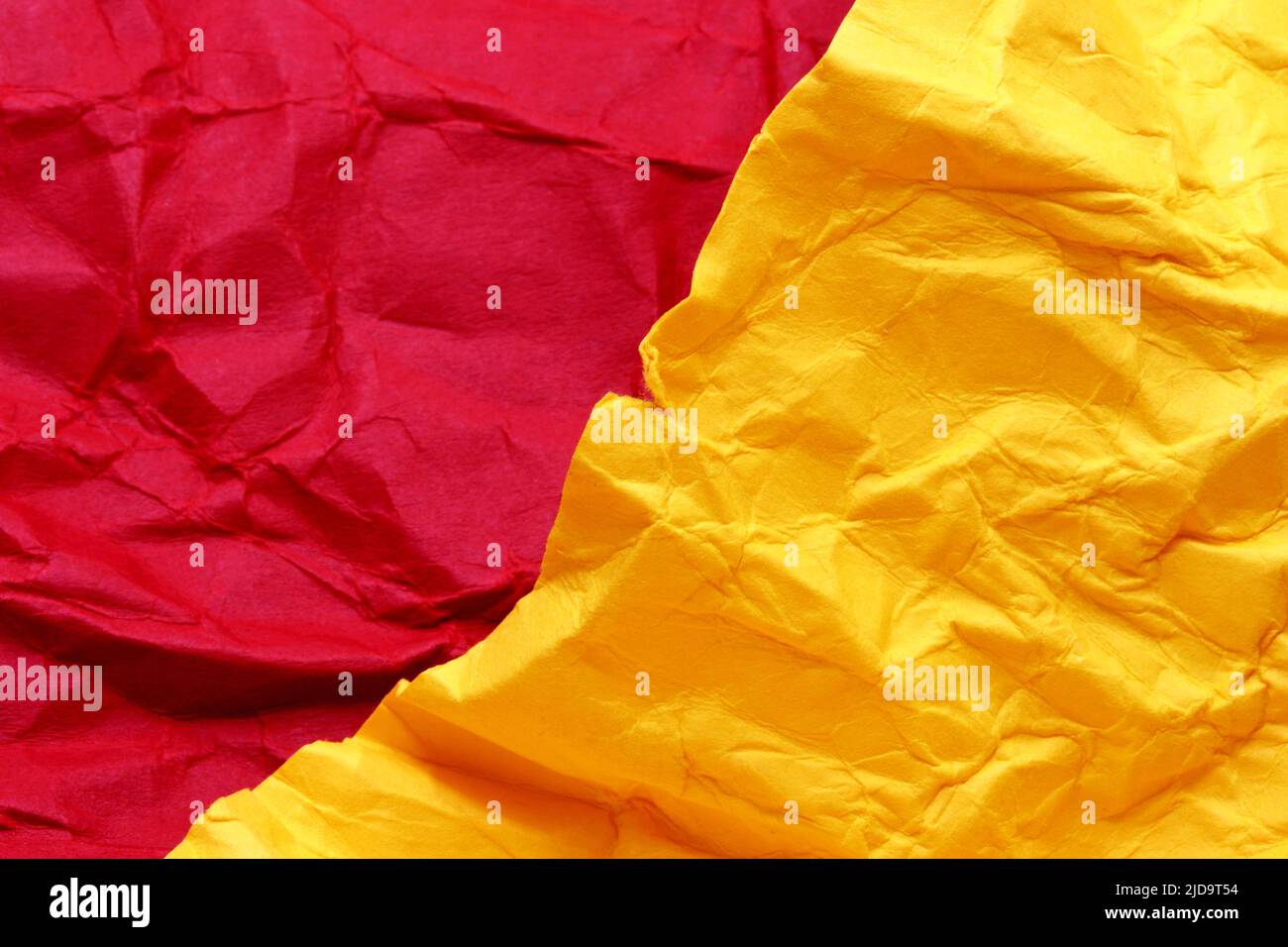 crumpled yellow and red paper texture background Stock Photo - Alamy