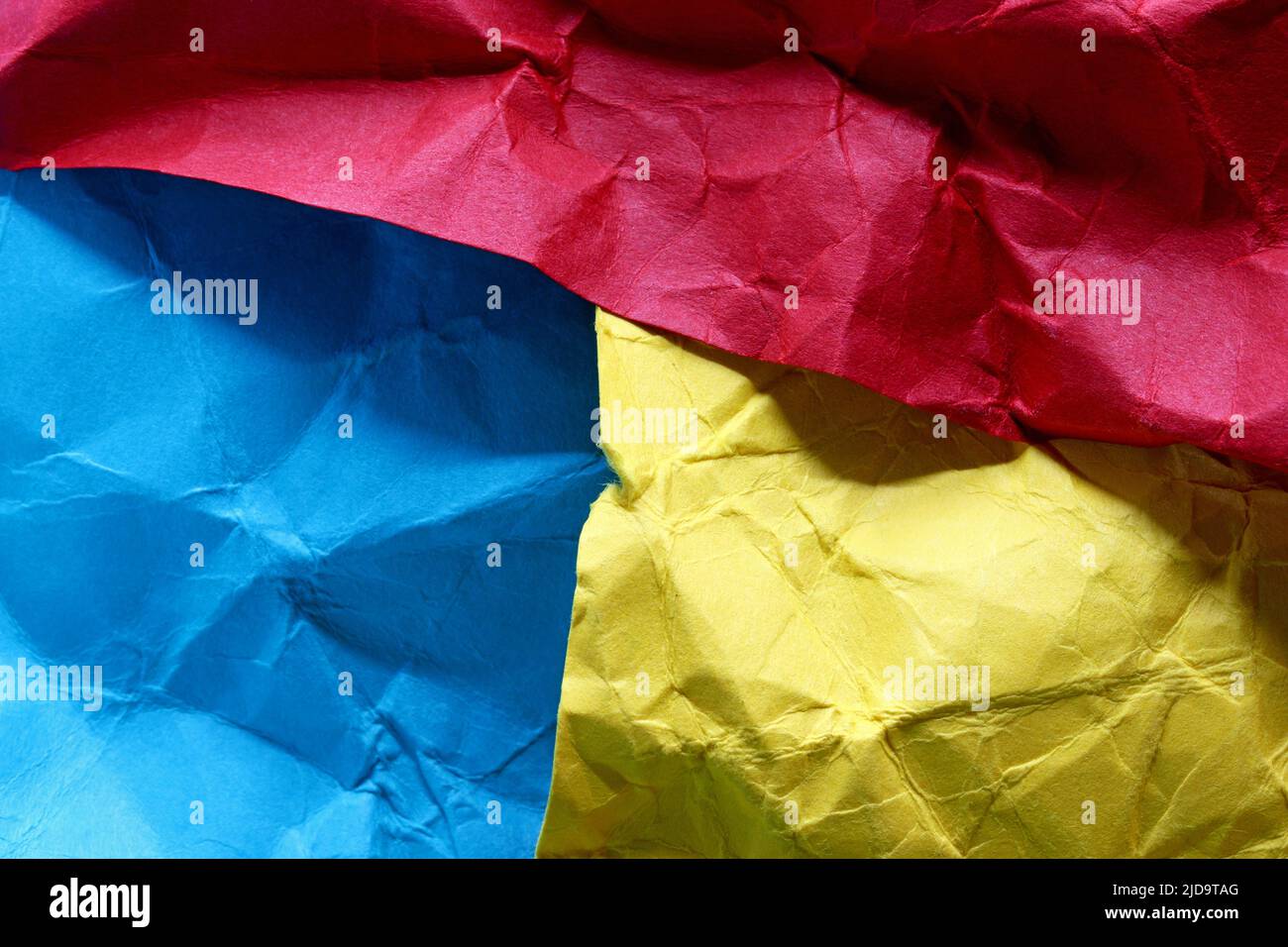 Crumpled colorful paper texture background Stock Photo - Alamy