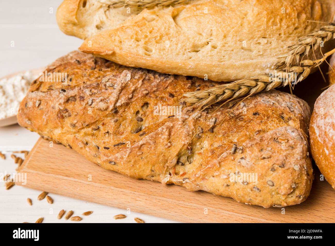 Homemade natural breads. Different kinds of fresh bread as background ...