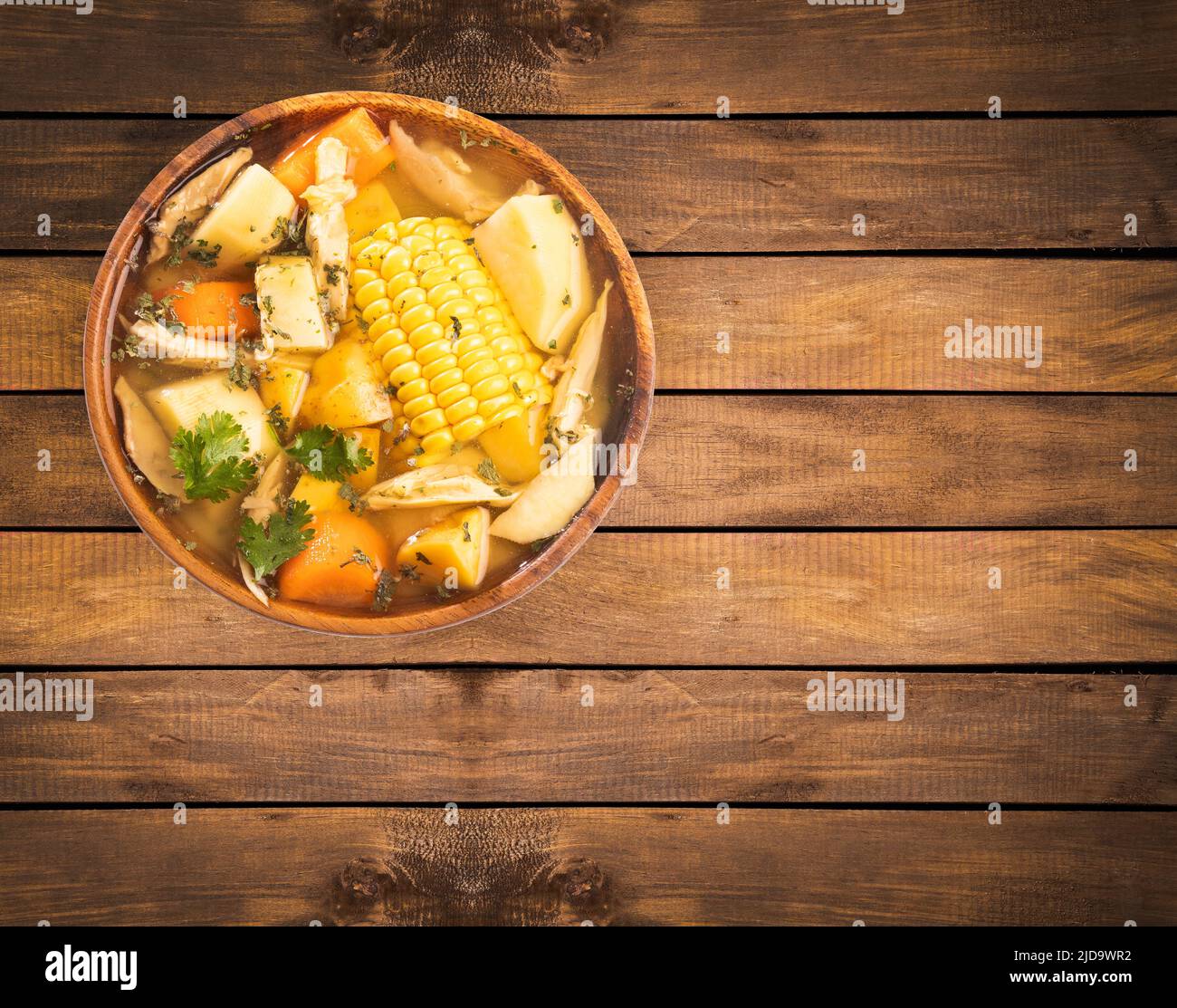 Colombian cuisine - ajiaco soup with chicken and vegetables Stock Photo ...