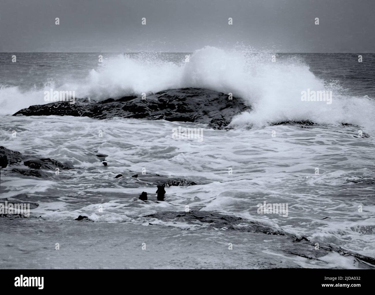 1950s waves crash on rocky hi-res stock photography and images - Alamy