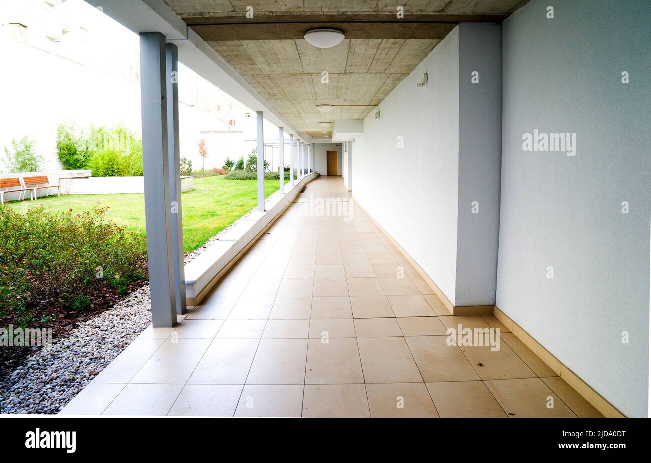 outdoor empty corridor with garden in the modern office building Stock ...