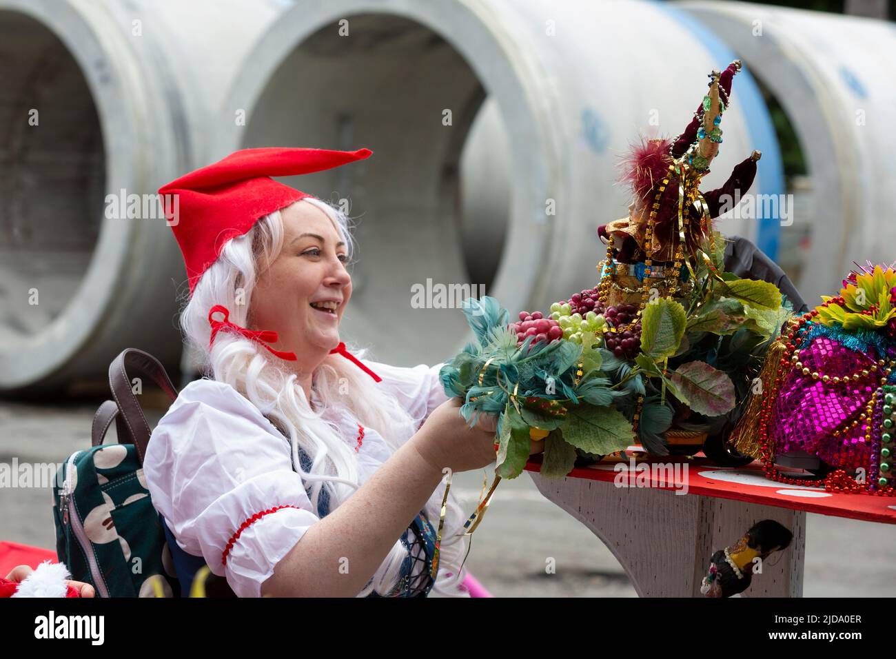 A member of the Petit Troll ensemble ready their float before the ...