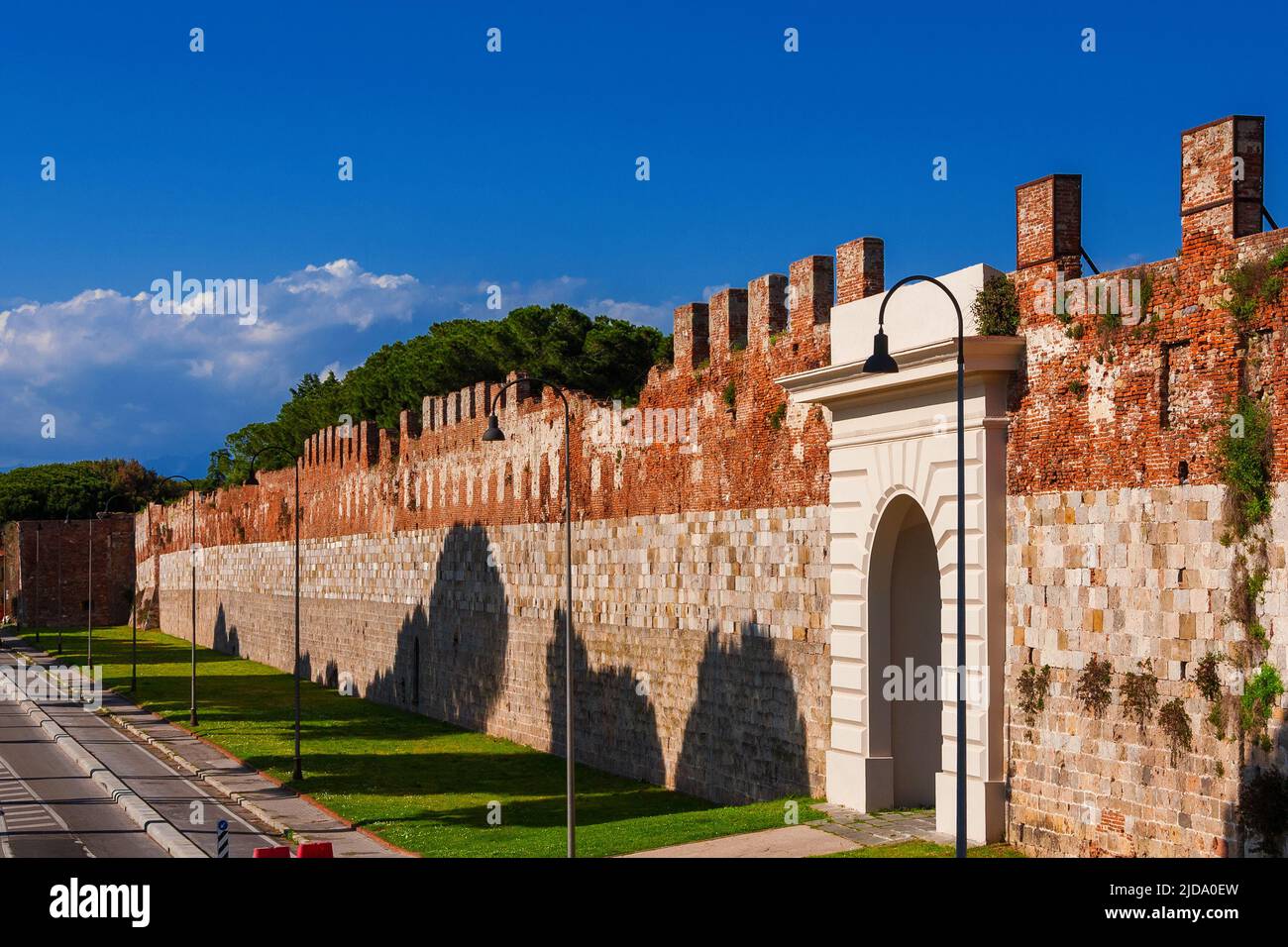 Pisa medieval walls ruins with blue sky Stock Photo - Alamy