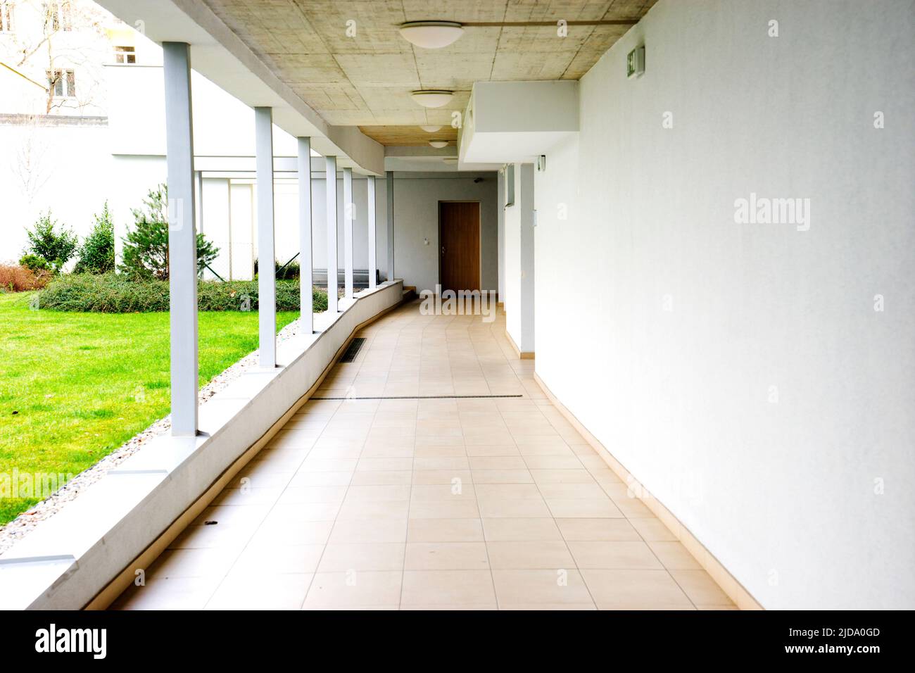 outdoor empty corridor with garden in the modern office building Stock ...