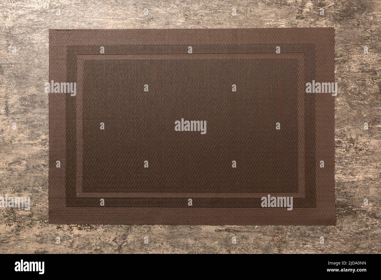 Top view of grey tablecloth for food on cement background. Empty space ...