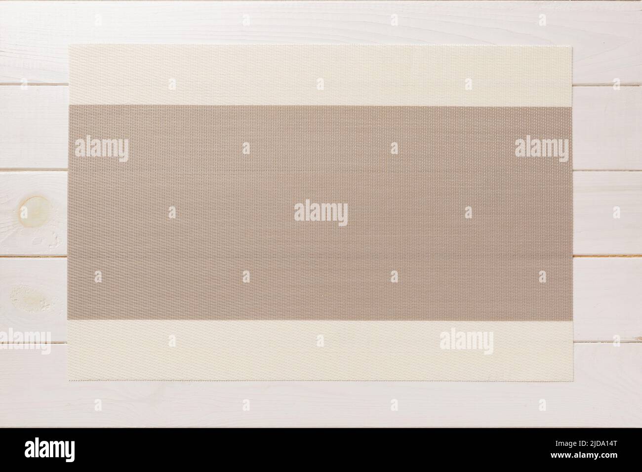 Top view of grey tablecloth for food on wooden background. Empty space ...