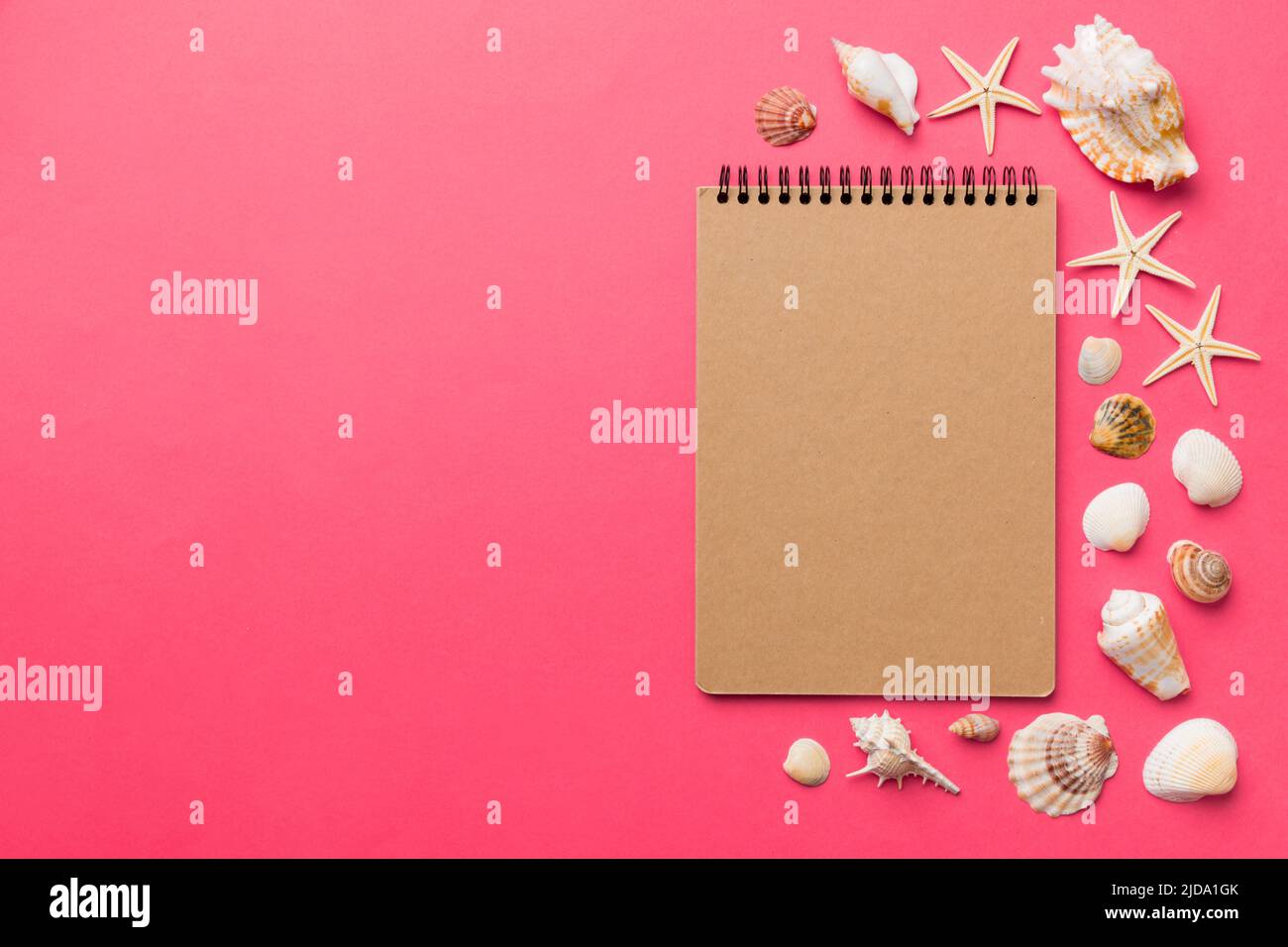 Blank writing book with summer beach accessories on background, copy ...