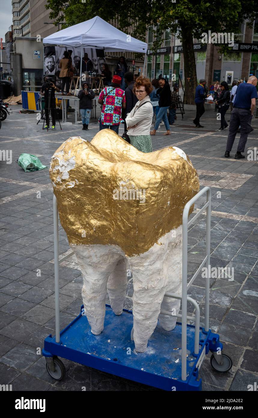 A model of a tooth. Brought to country by a Belgian policeman, the ...