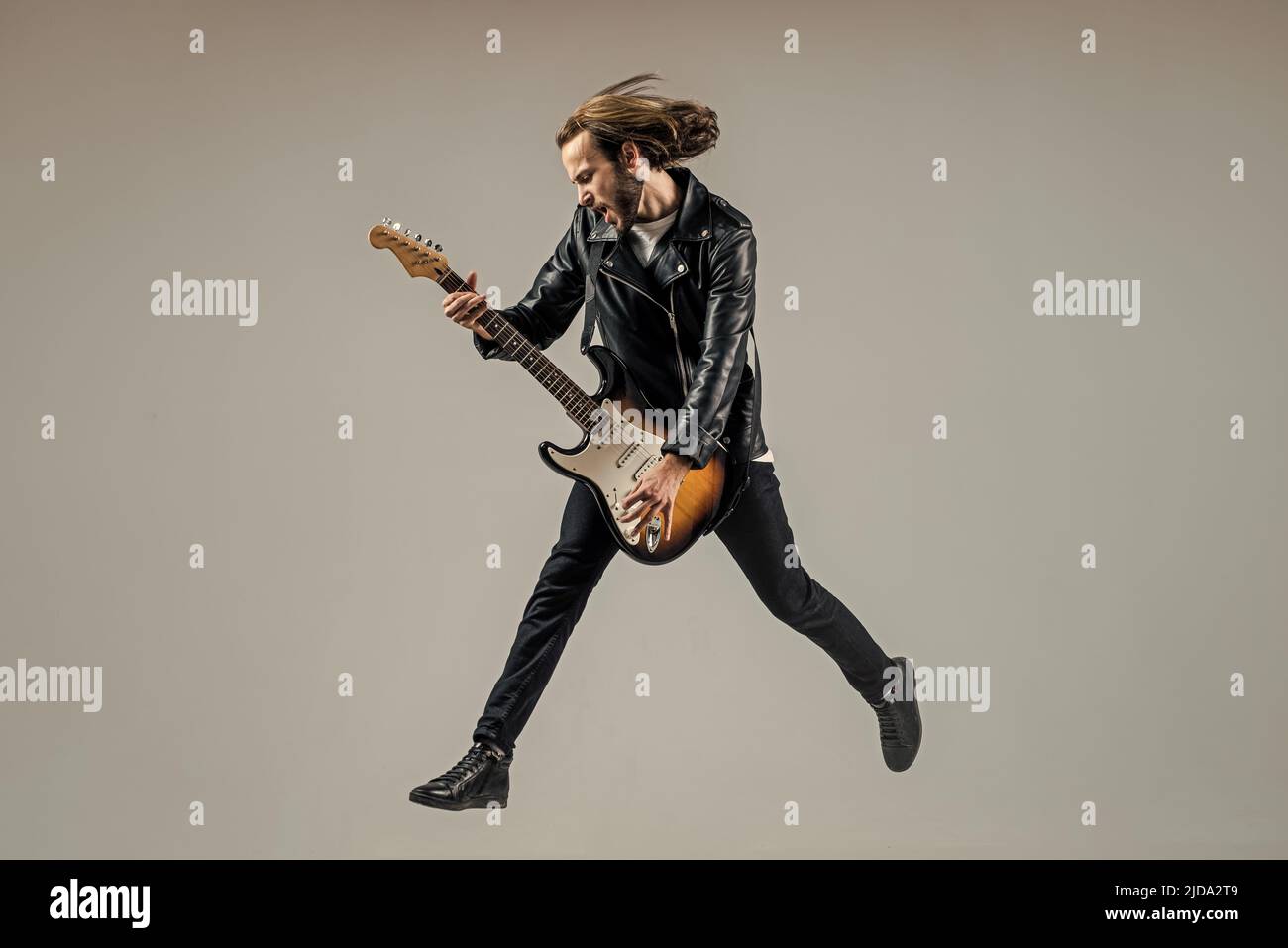 Emotional bearded rocker in hi-res stock photography and images - Alamy