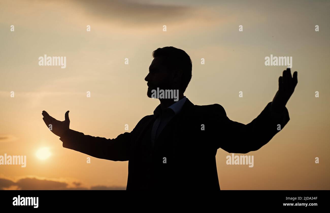 personal achievement goal. man silhouette on sky background Stock Photo ...