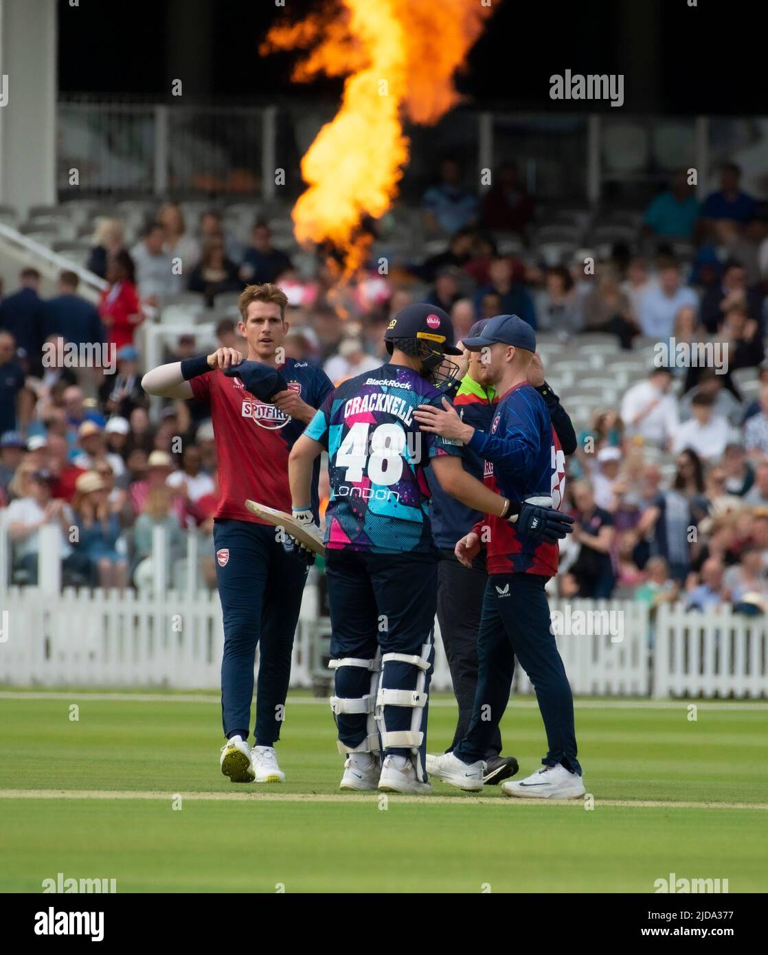 Joe Cracknell shakes hands with the Kent players and umpires after a ...