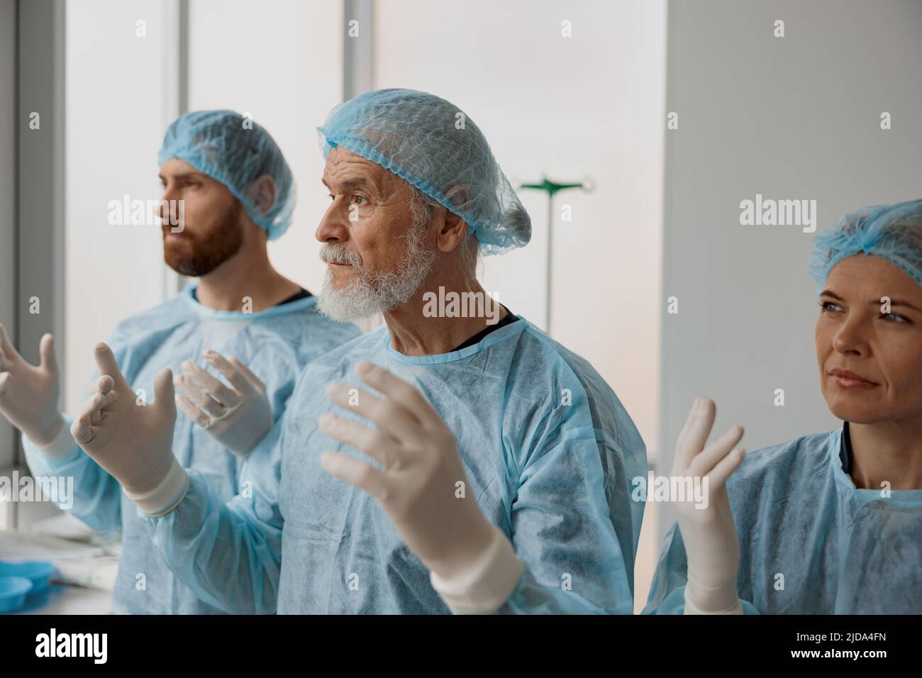Team of surgeons in the operating room ready for surgery in clinic ...