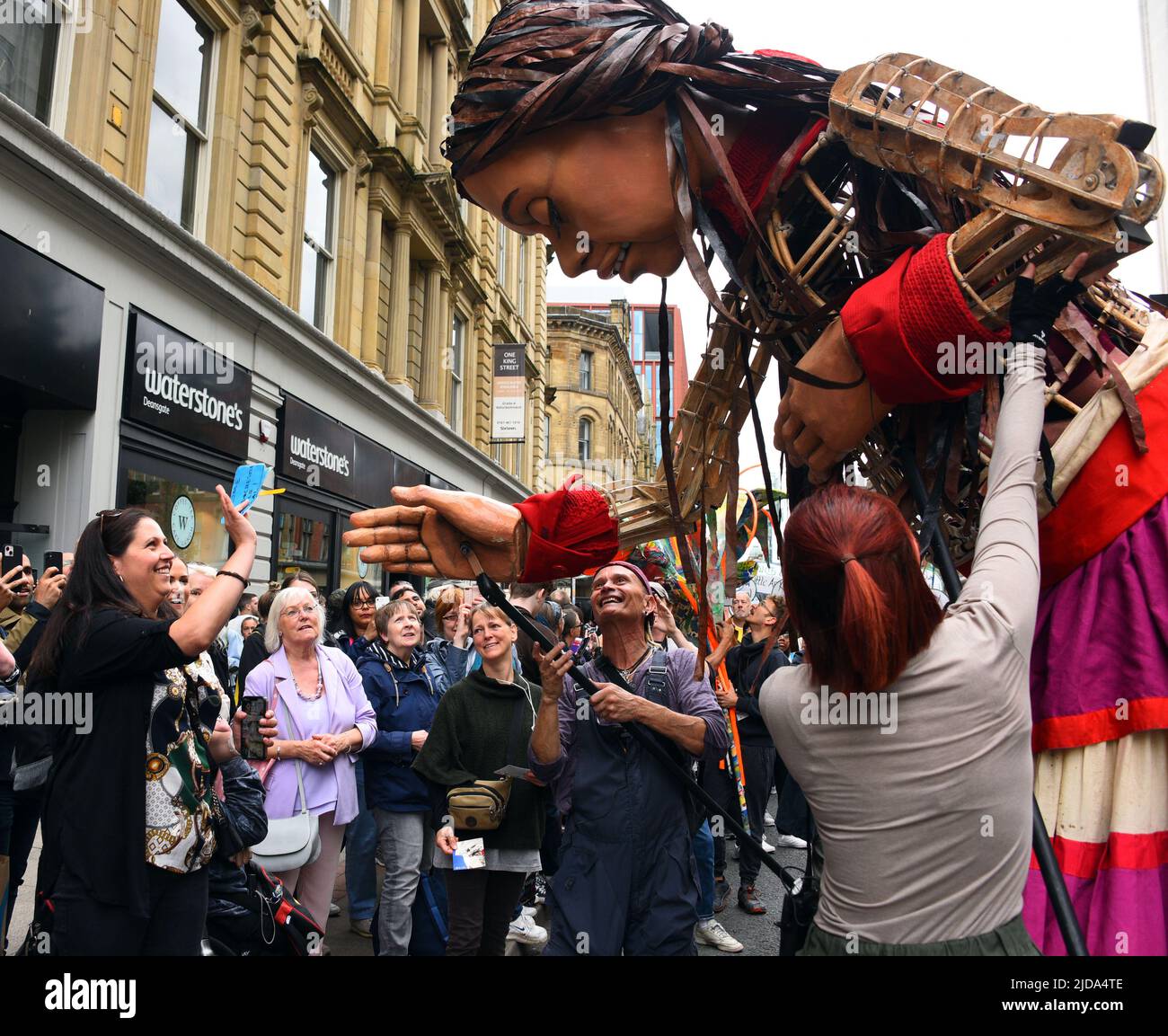 Manchester Day Parade 2022Amal srian refugee puppet and crowd Credit ...