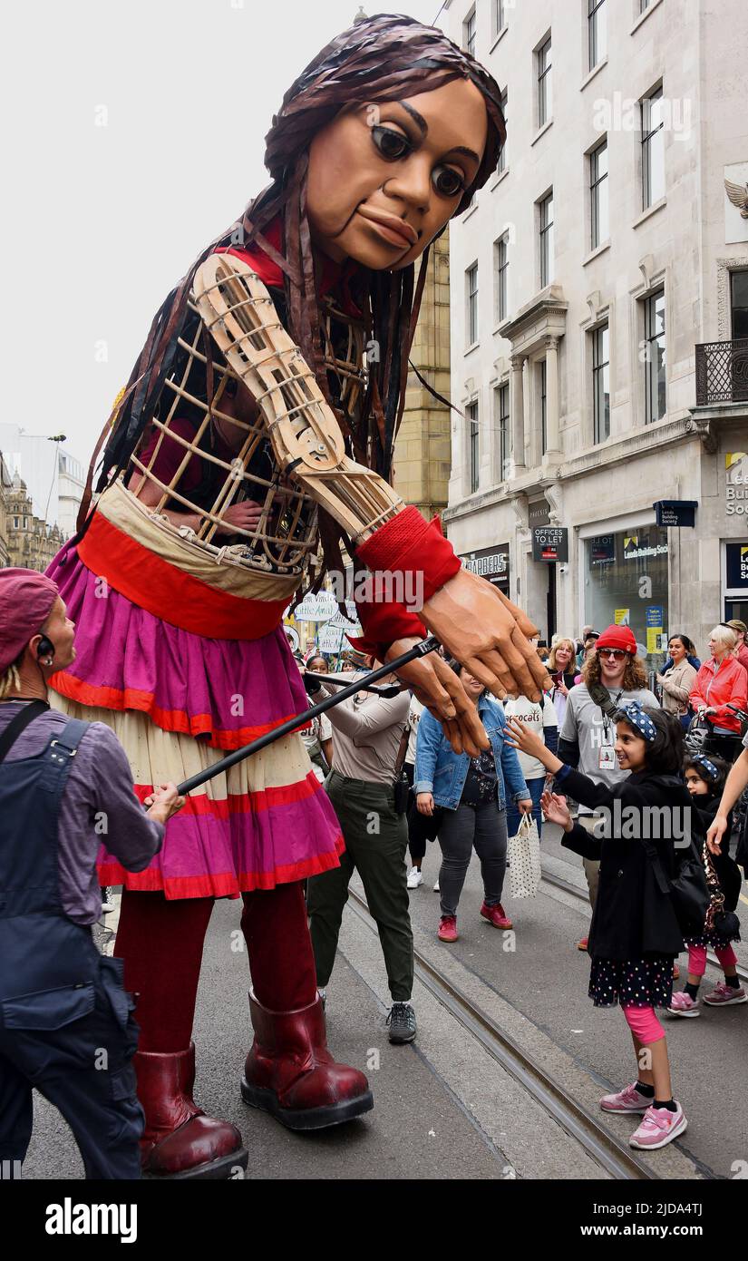 Refugee girl puppet hi-res stock photography and images - Alamy