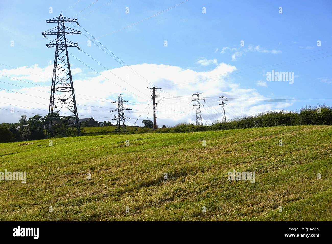 Pylons in the countryside Stock Photo - Alamy