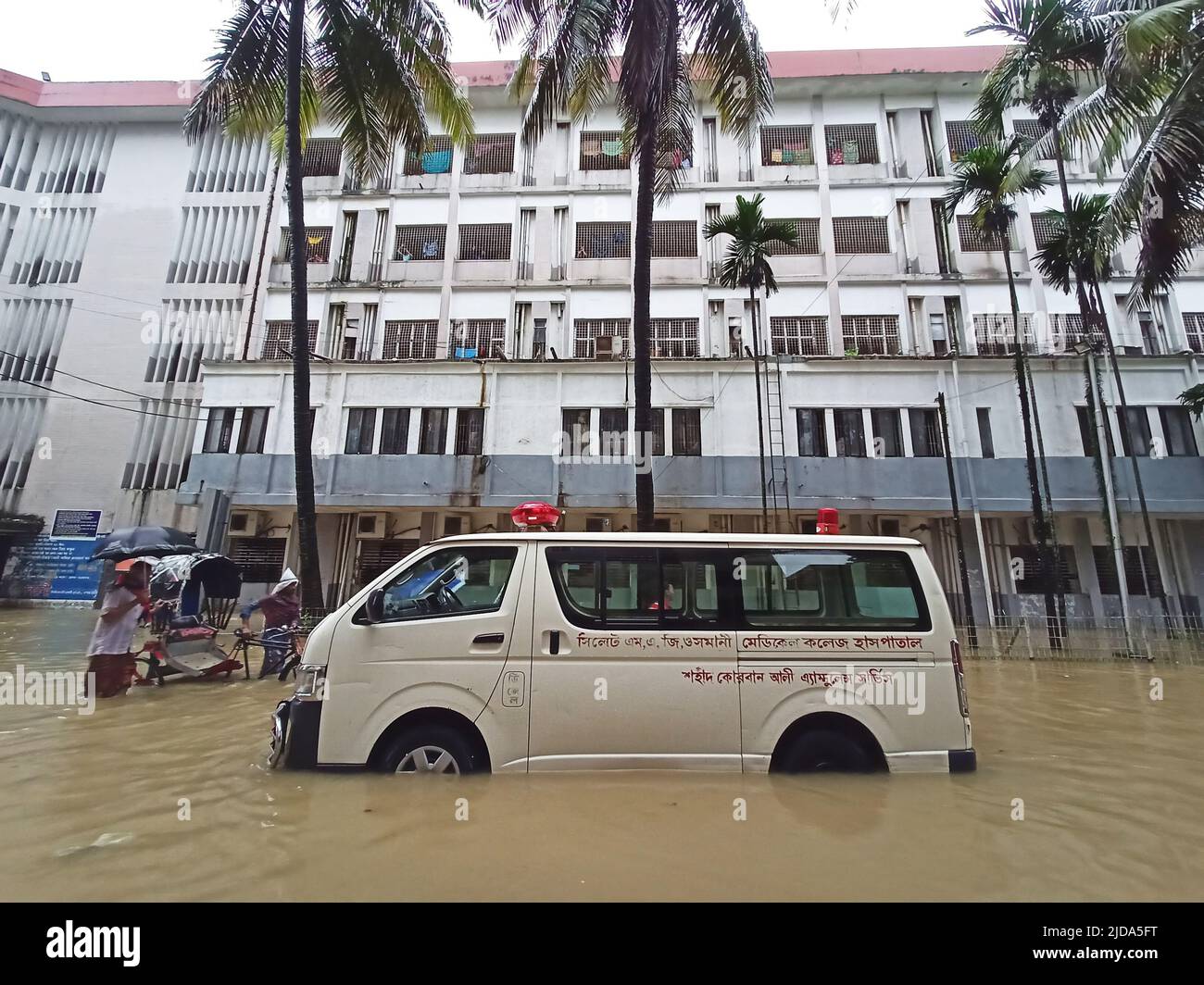 Sylhet, Bangladesh. 19th June 2022. Ambulence submerged in flood water ...
