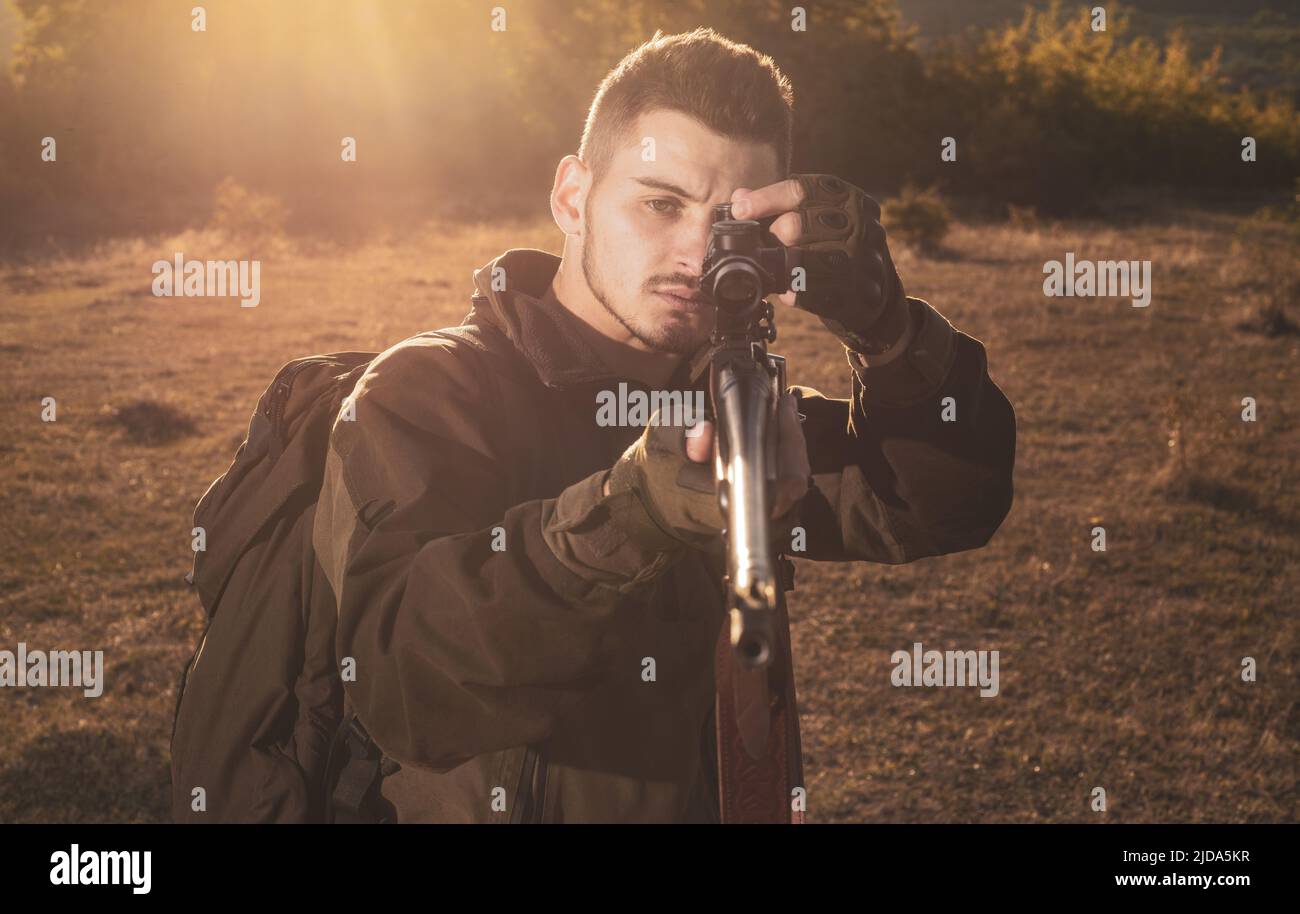 Hunting gun. Hunter with shotgun gun on hunt. Calibers of hunting ...