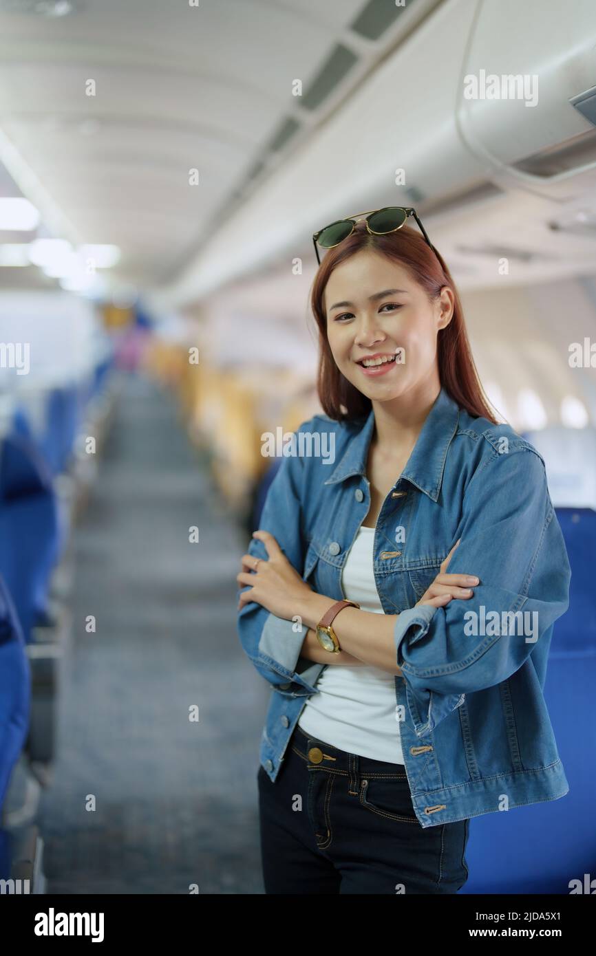 travel business Portrait of an Asian woman showing joy while waiting ...