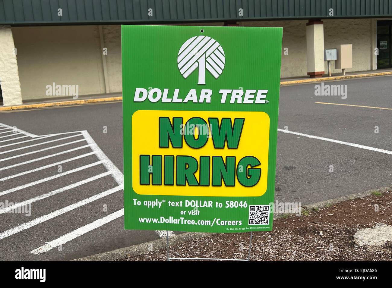 A Now Hiring employees sign at a Dollar Tree store, Thursday, June 8 ...