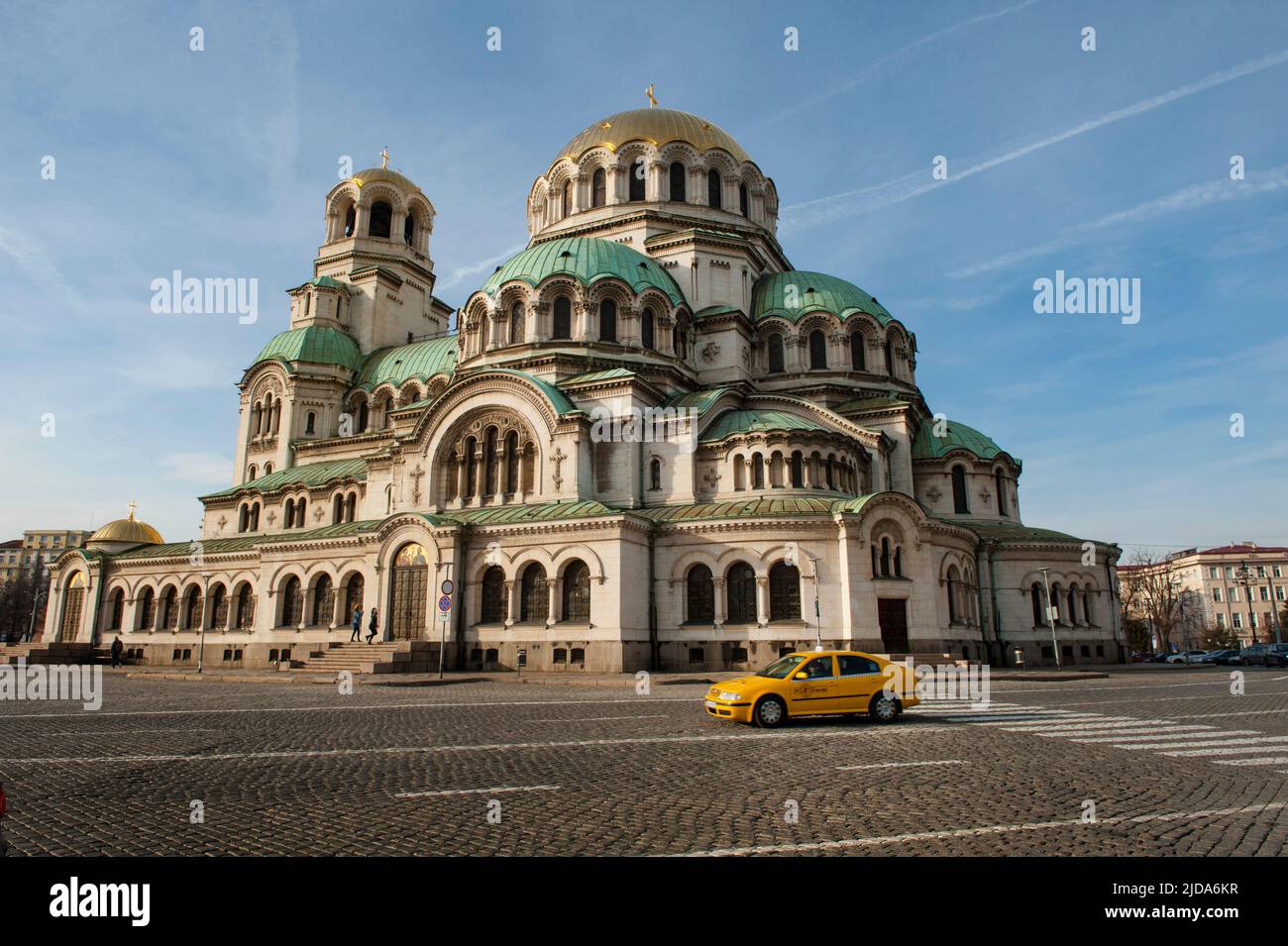 A Bulgarian Taxi drives past the Alexander Nevsky Cathedral, Sofia. Bulgaria. Landmarks of the ...