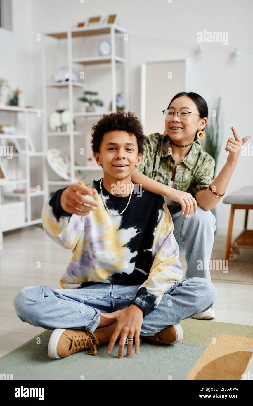 Vertical full length portrait of two gen Z teenagers boy and girl ...