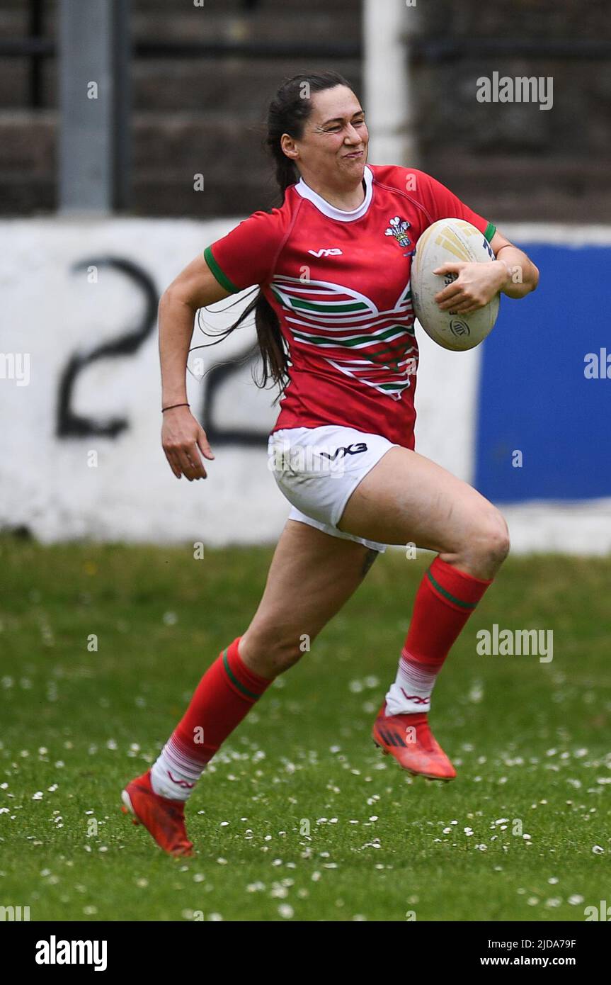 Anne-Marie Sayle of Wales RL, breaks away to score her try to make it ...
