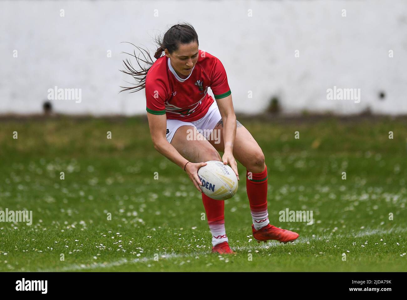 Anne-Marie Sayle of Wales RL, breaks away to score her try to make it ...