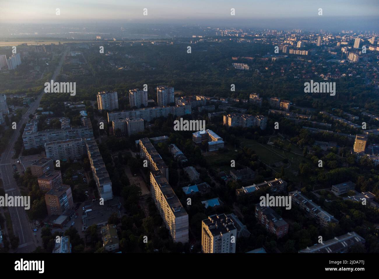 Sunny morning view in summer city residential district. Aerial ...