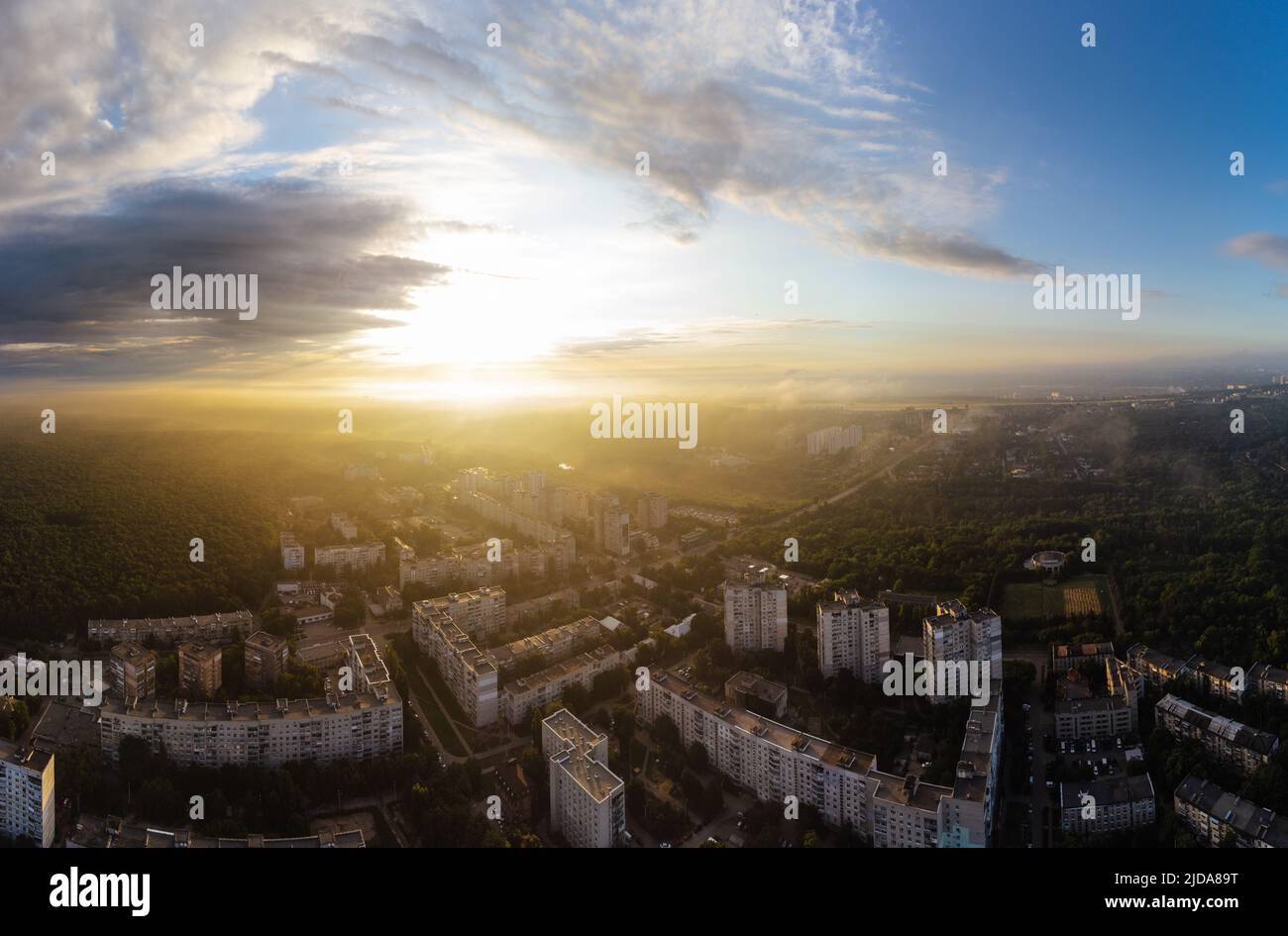Aerial panoramic sunrise morning city view on residential district with ...