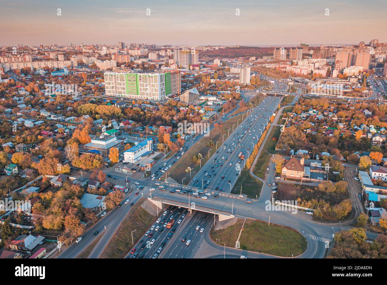 City crossroads and overpasses with traffic aerial view. Transport in ...