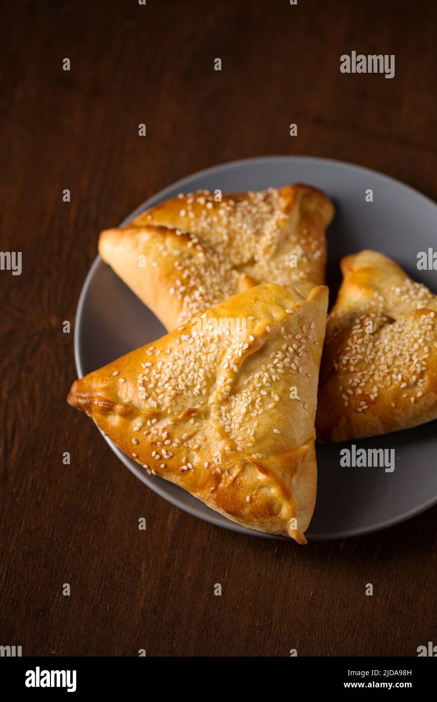 Ruddy pies with suluguni cheese sprinkled with sesame seeds Stock Photo ...