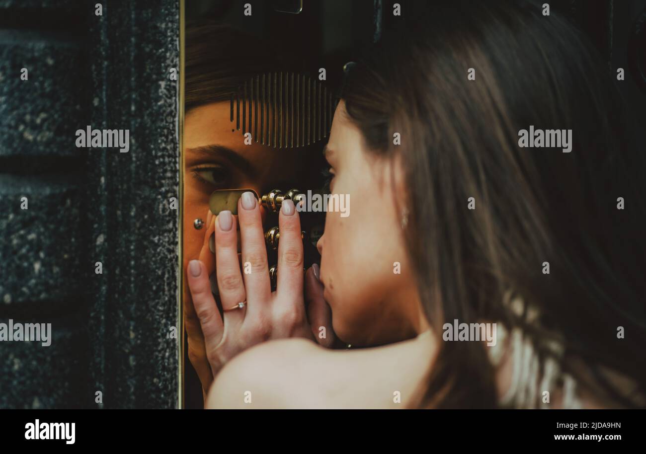 Woman intercom button. Lady girl doorbell at building entrance. Young ...