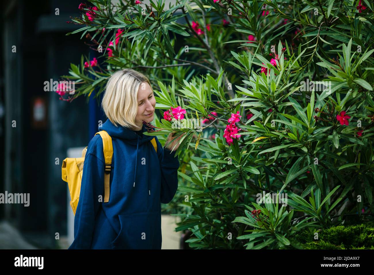 Lady smelling plants hi-res stock photography and images - Alamy