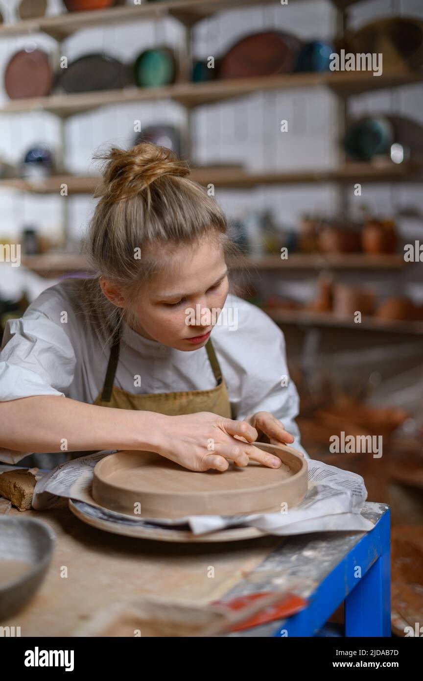 Beautiful potter girl makes hi-res stock photography and images - Alamy
