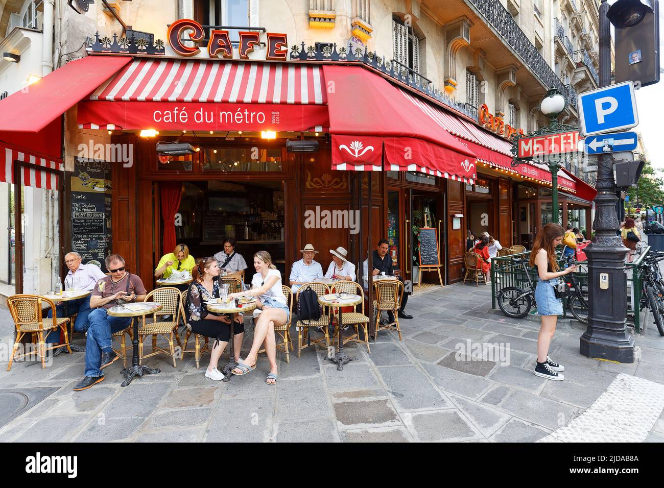 View of typical Parisian cafe du Metro . It is located near famous ...
