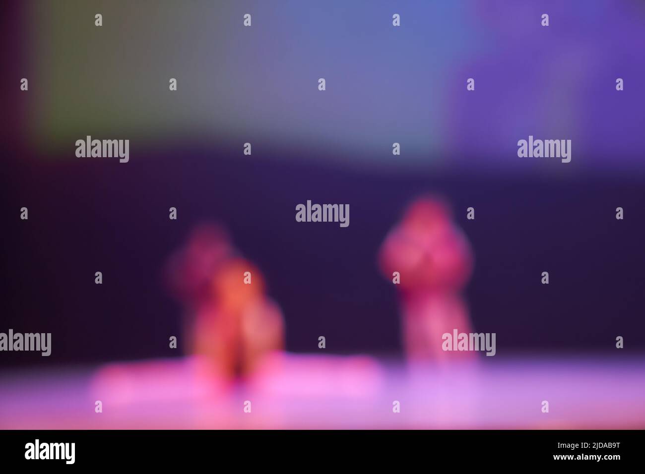 Silhouettes of small dancers with elements of gymnastic dance. Colored ...